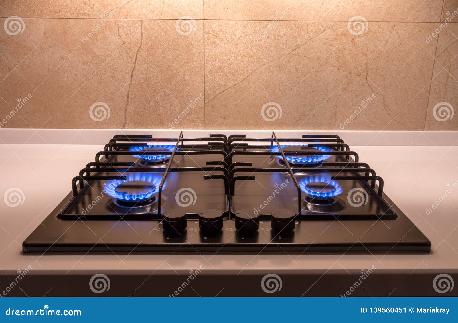 Gas Burner on Black Modern Kitchen Stove Stock Image - Image of closeup ...