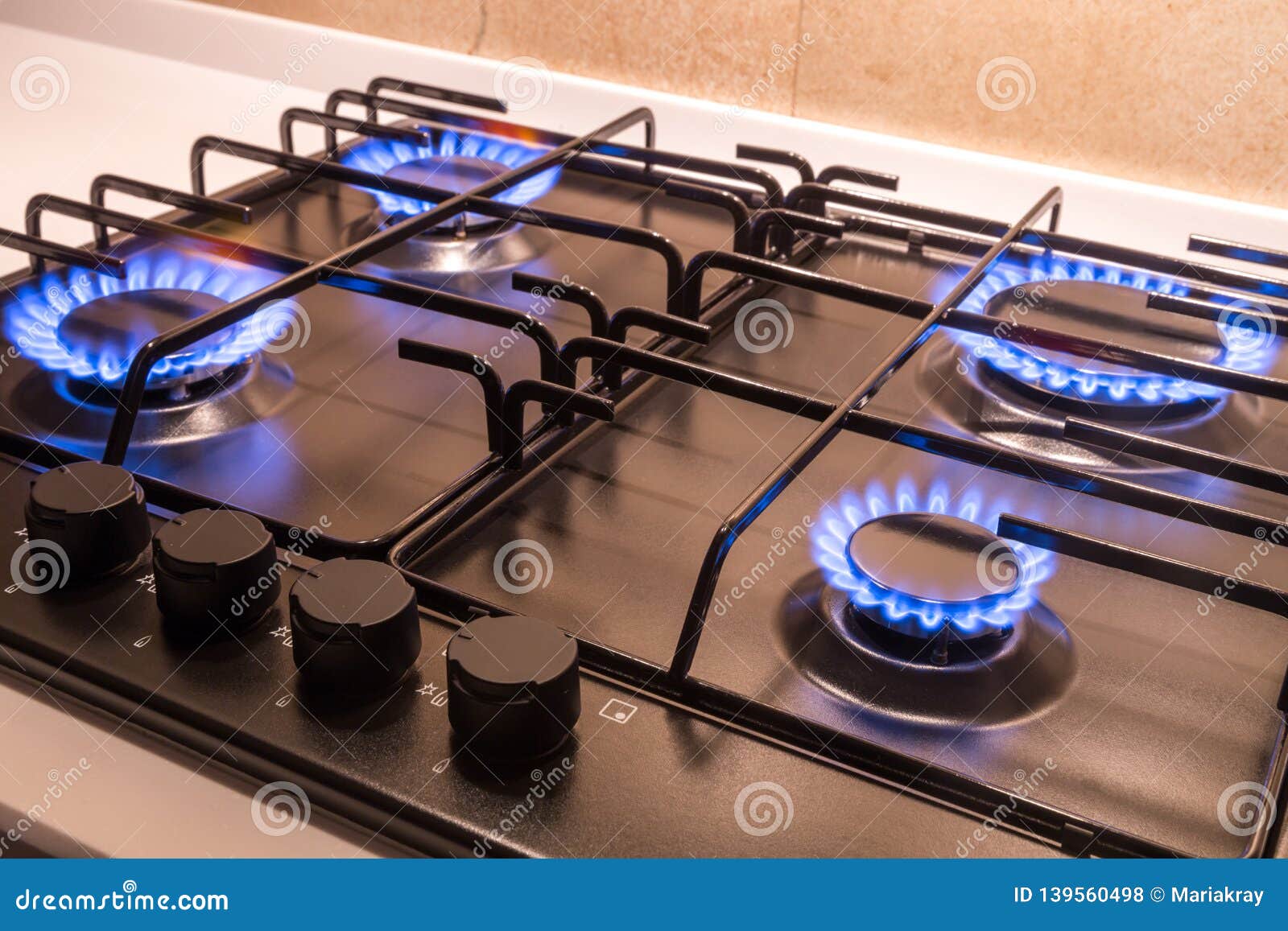 Gas Burner on Black Modern Kitchen Stove Stock Photo - Image of closeup ...