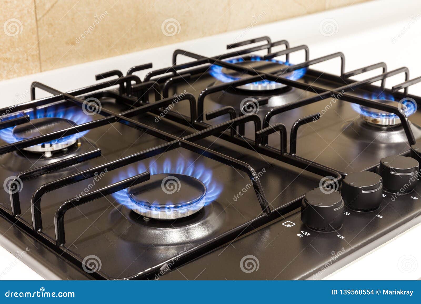 Gas Burner on Black Modern Kitchen Stove Stock Photo - Image of ...