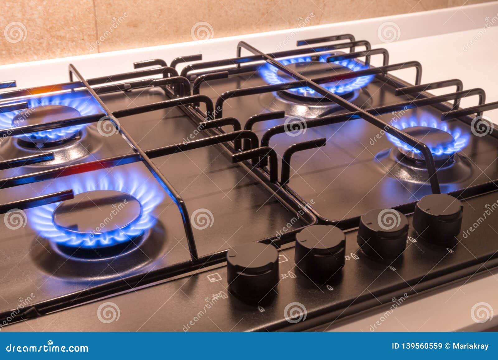 Gas Burner on Black Modern Kitchen Stove Stock Image - Image of blaze ...