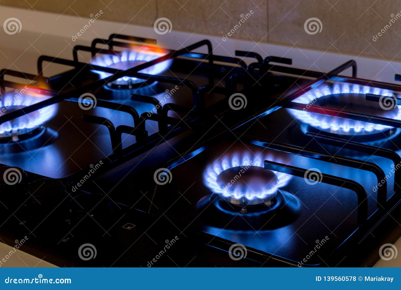 Gas Burner on Black Modern Kitchen Stove Stock Photo - Image of cooking ...