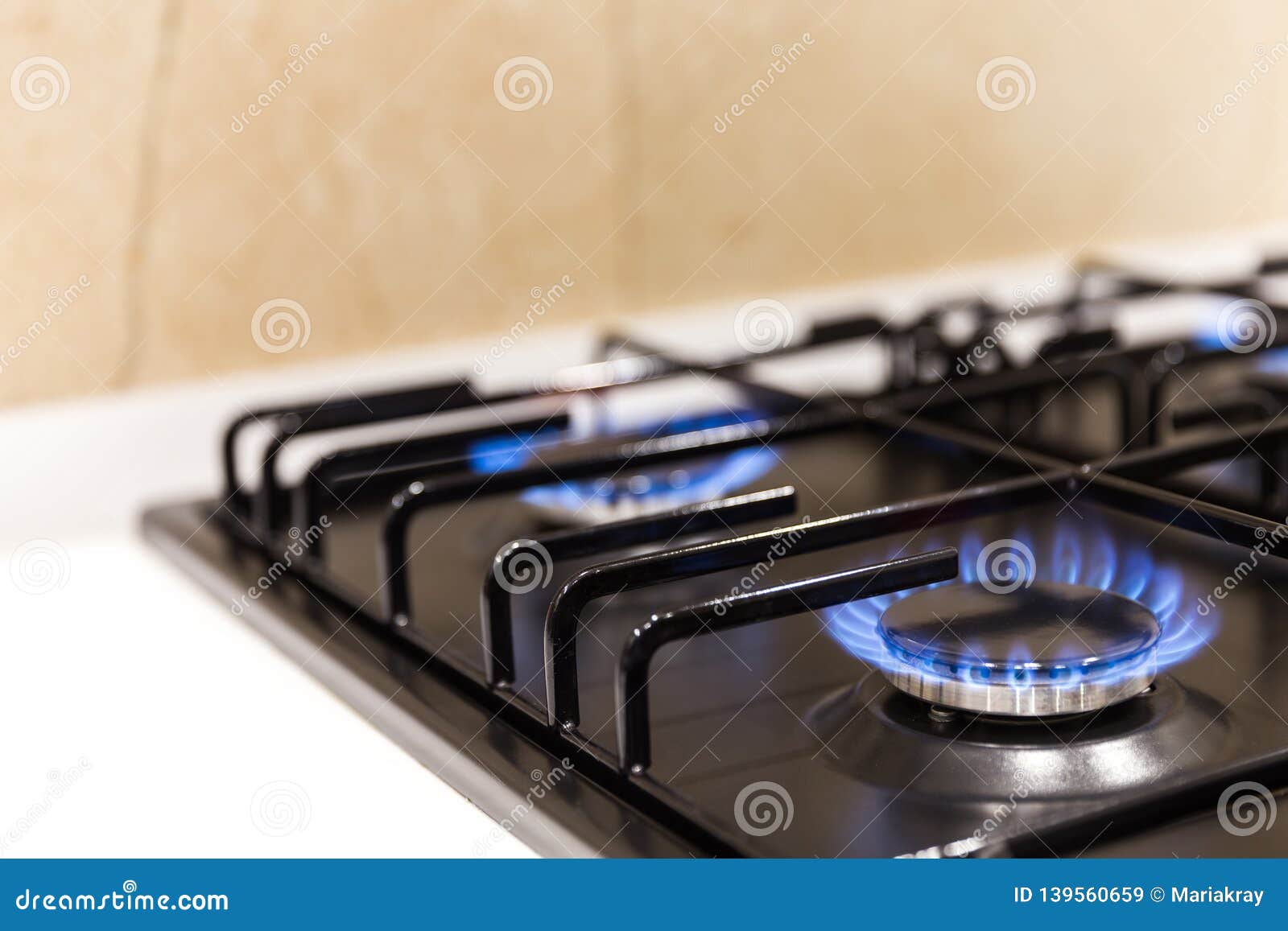 Gas Burner on Black Modern Kitchen Stove Stock Image - Image of flame ...