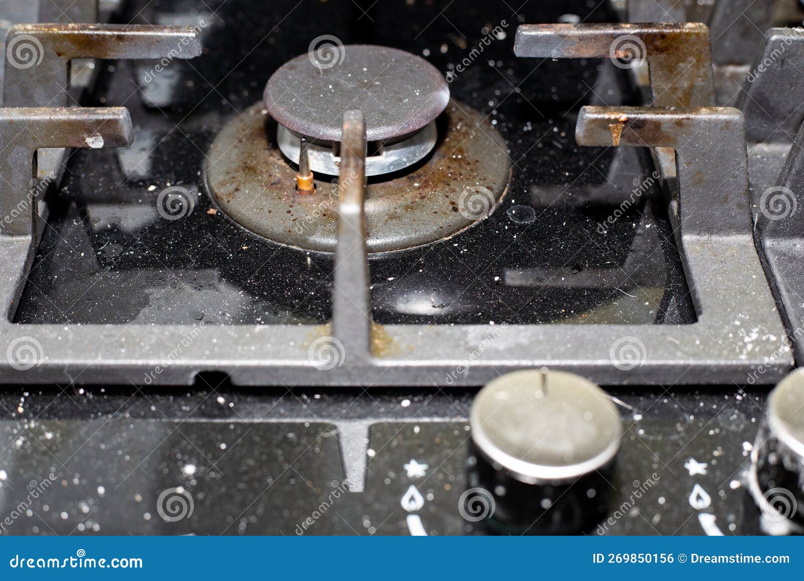 Gas Burner on Black Tempered Glass Surface with a Layer of Dust and ...
