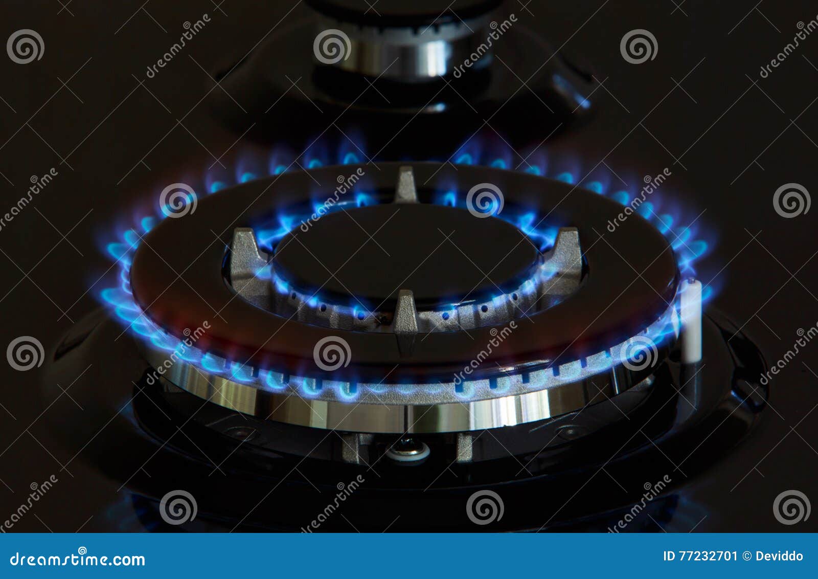 Gas burners lit stock image. Image of spark, shine, heat - 77232701