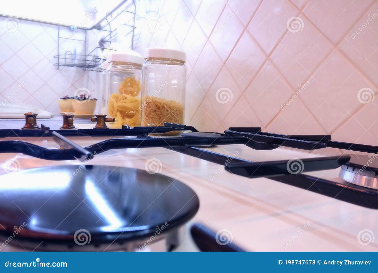 Gas Cooker in Front of a White Kitchen Stock Photo - Image of kitchen ...