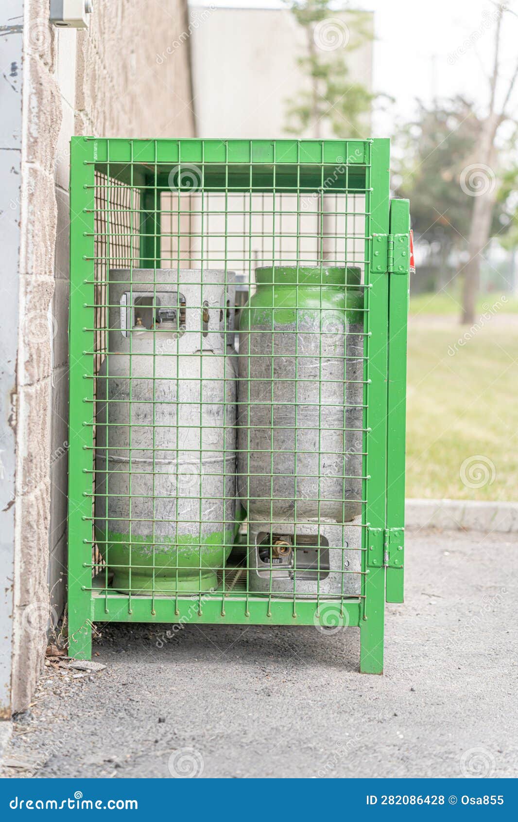 Gas Cylinders in a Cage for Storage Safekeeping Stock Photo - Image of ...