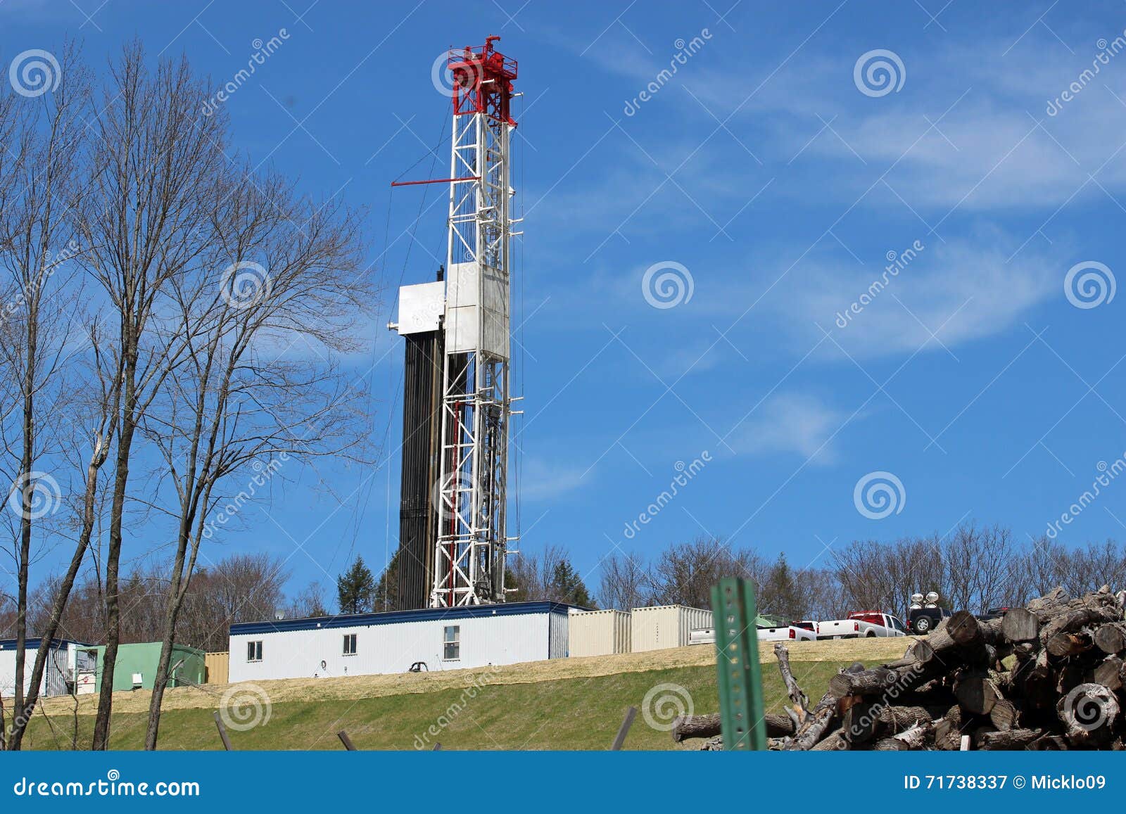 Gas drilling pad stock image. Image of trucks, buildings - 71738337
