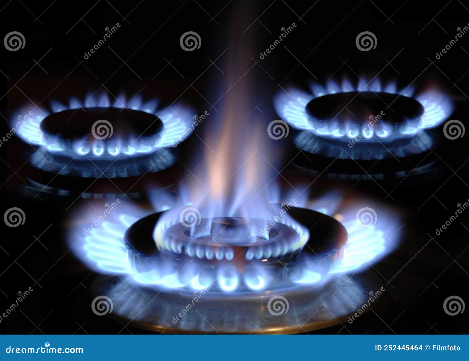 Gas flame burns on a stove stock photo. Image of kitchen - 252445464