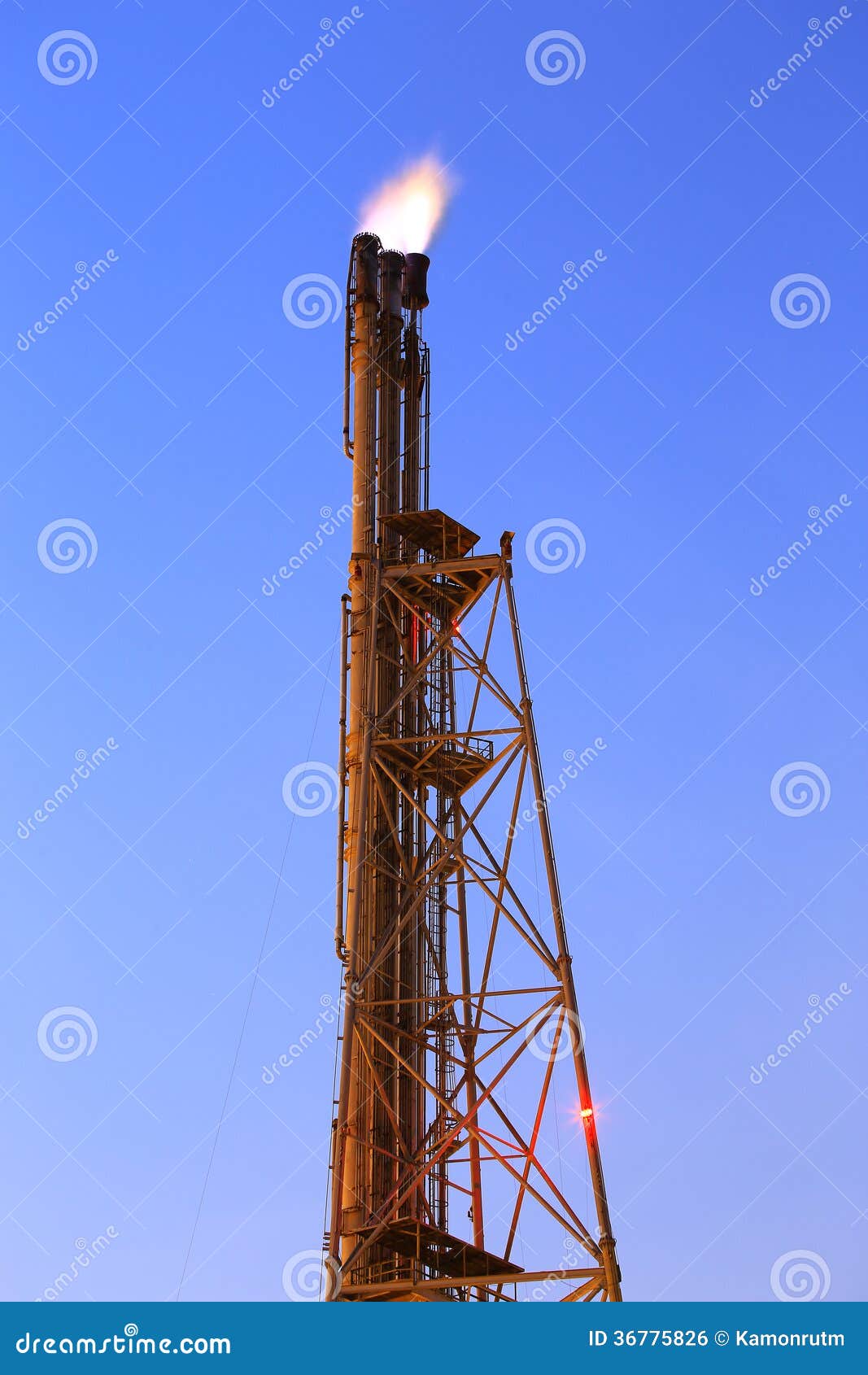 Gas flare at a refinery stock photo. Image of burning - 36775826