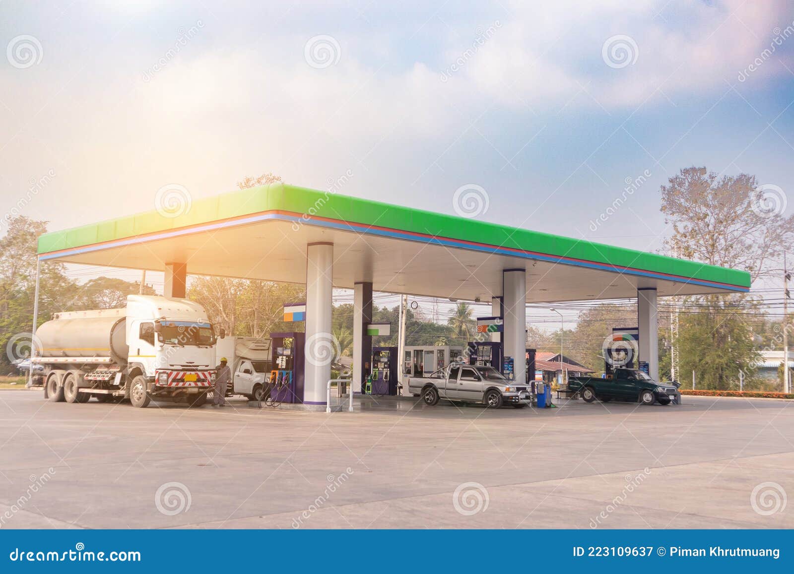 Gas Fuel Station with Clouds Sky and Sun Light Editorial Photography ...