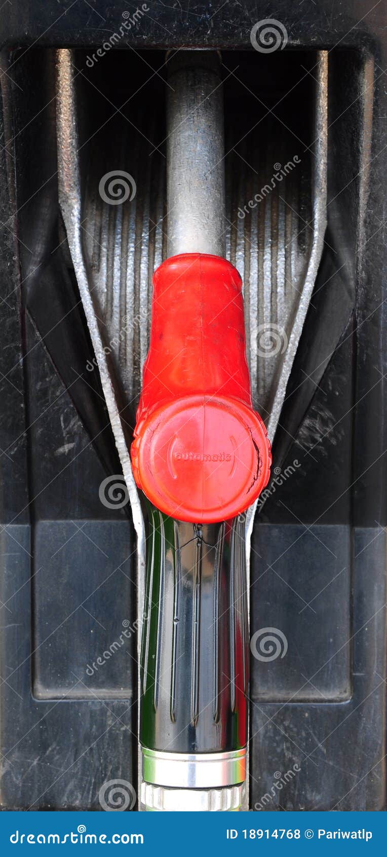 Gas Pump Nozzles in a Service Station Stock Photo - Image of barrel ...
