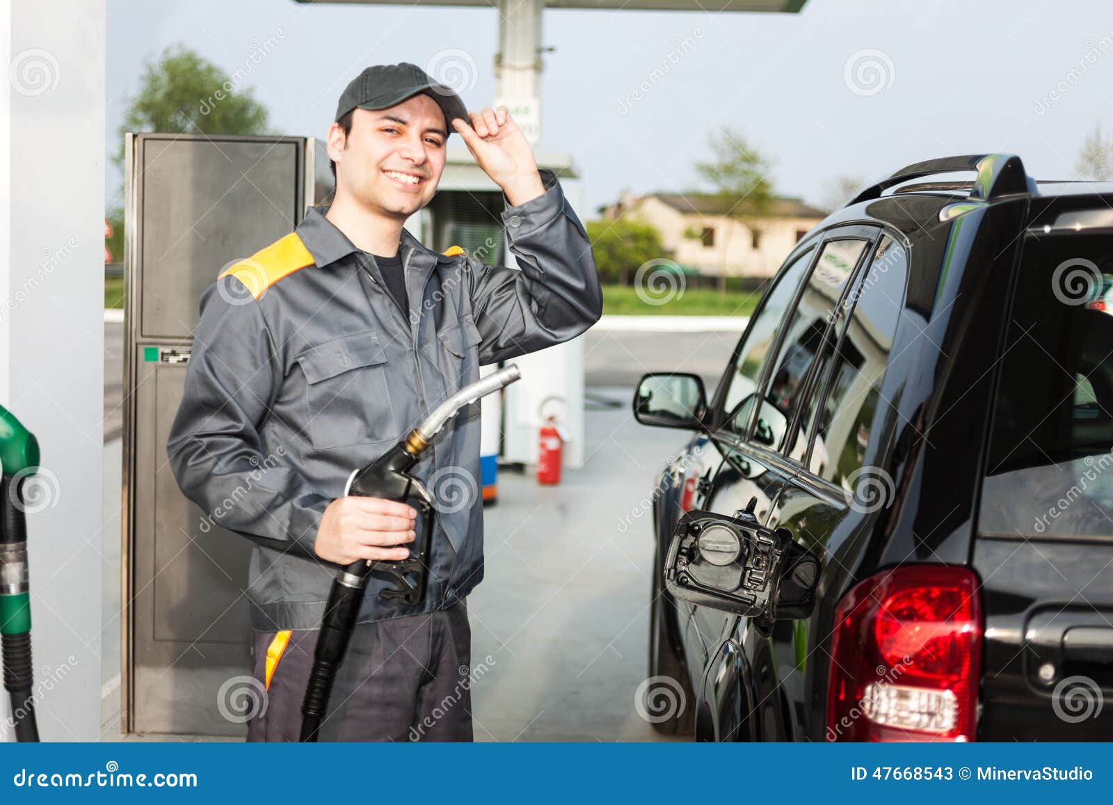 Gas Station Attendant at Work Stock Image - Image of owner, gallon ...