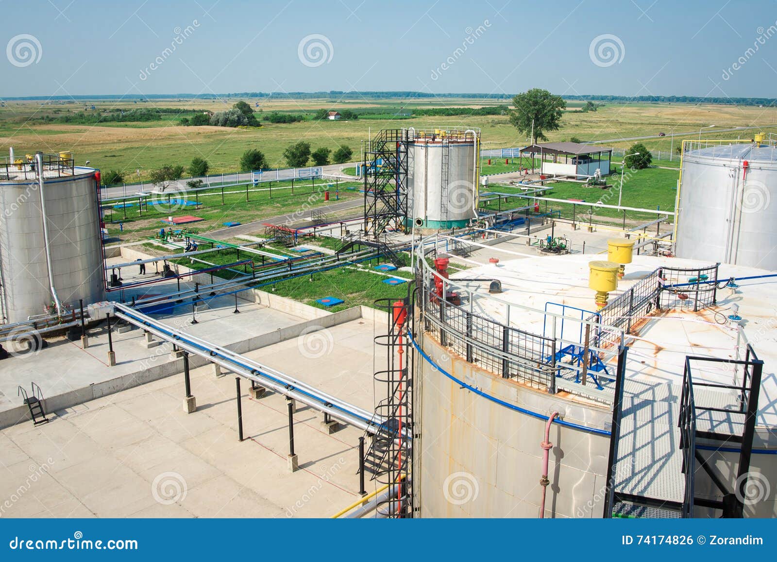 Gas Tank in Oil Processing Plant Stock Photo - Image of ladder, metal ...