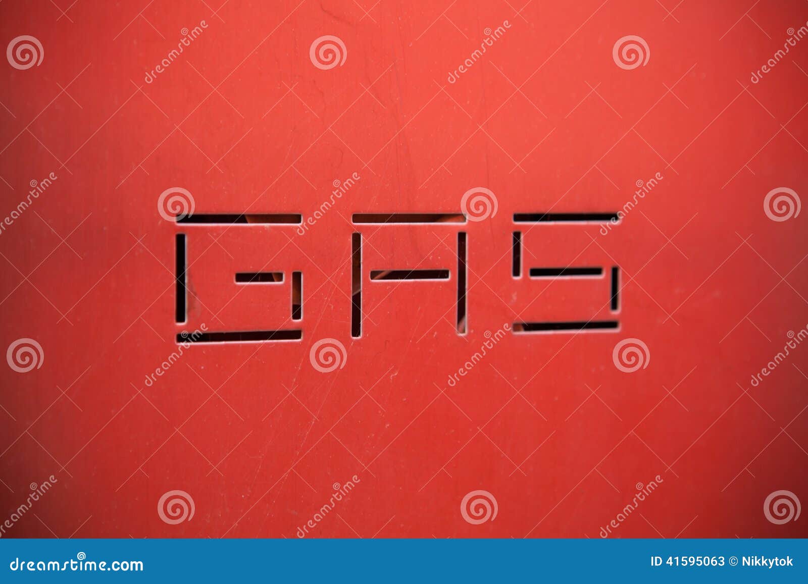 Gas title on red surface stock image. Image of inscription - 41595063