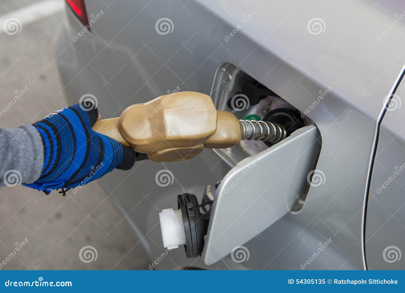 Gas up stock image. Image of broken, hose, male, outdoors - 54305135