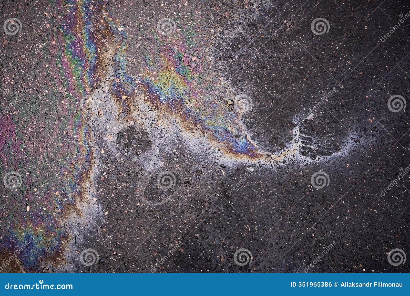 Gasoline or Oil Spill on Asphalt Creating Rainbow Color Pattern. Stock ...