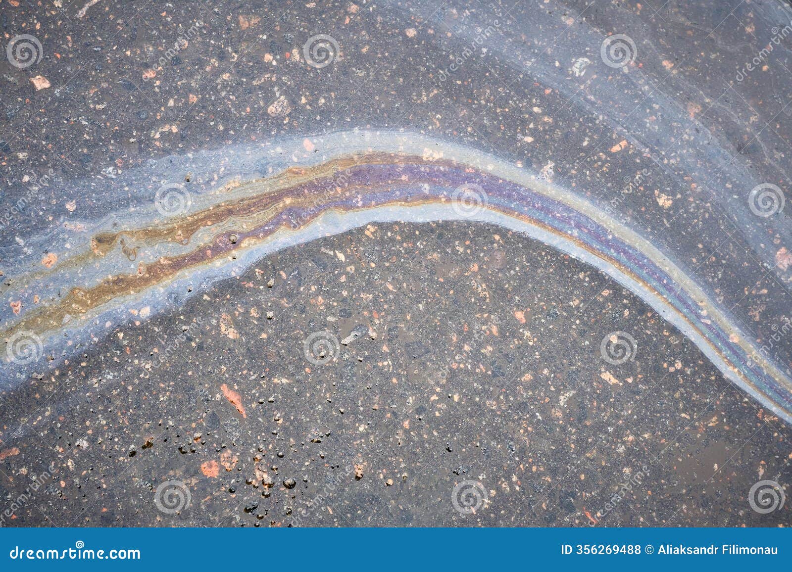Gasoline or Oil Spill Polluting Asphalt Road Surface. Stock Photo ...