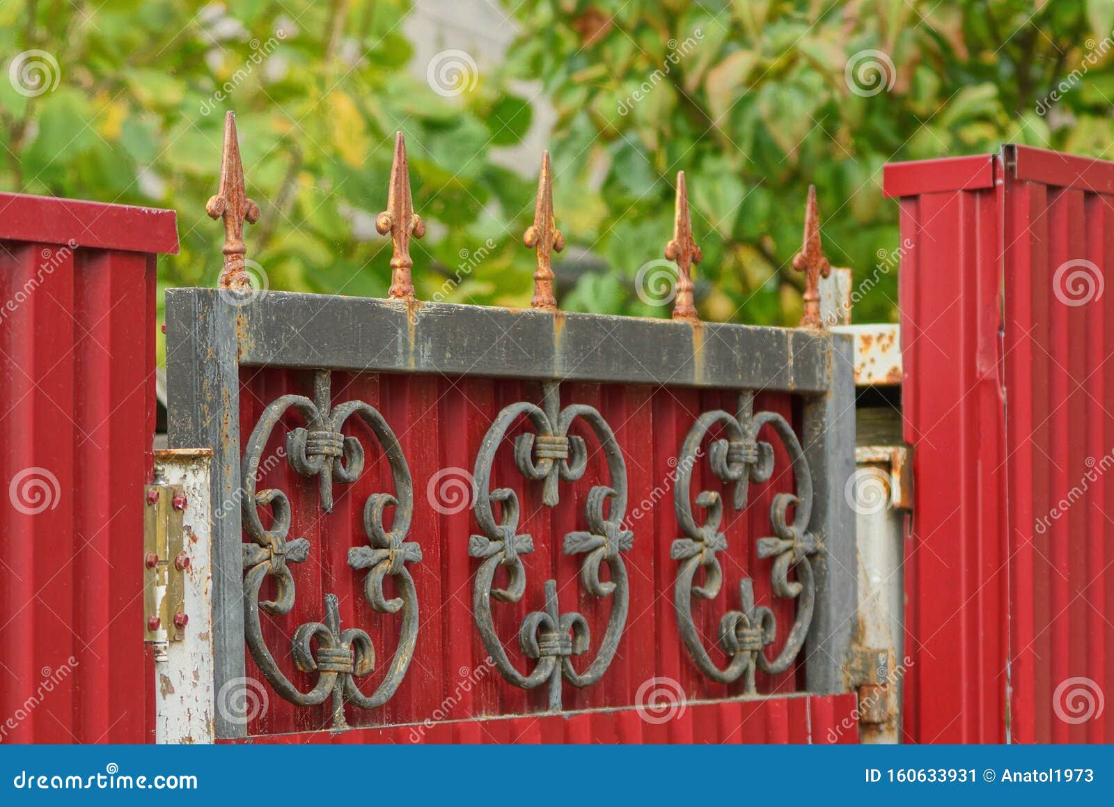 Gate with a Black Forged Pattern with Sharp Rods Stock Image - Image of ...