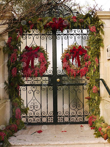 Gate with Christmas Decorations Stock Photo - Image of ribbon, entrance ...