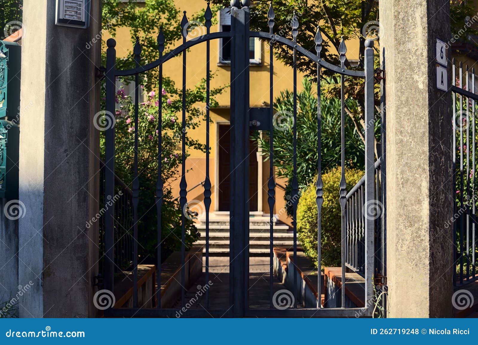 Gate and Door with Plants Surrounding Them and the Facade Stock Photo ...