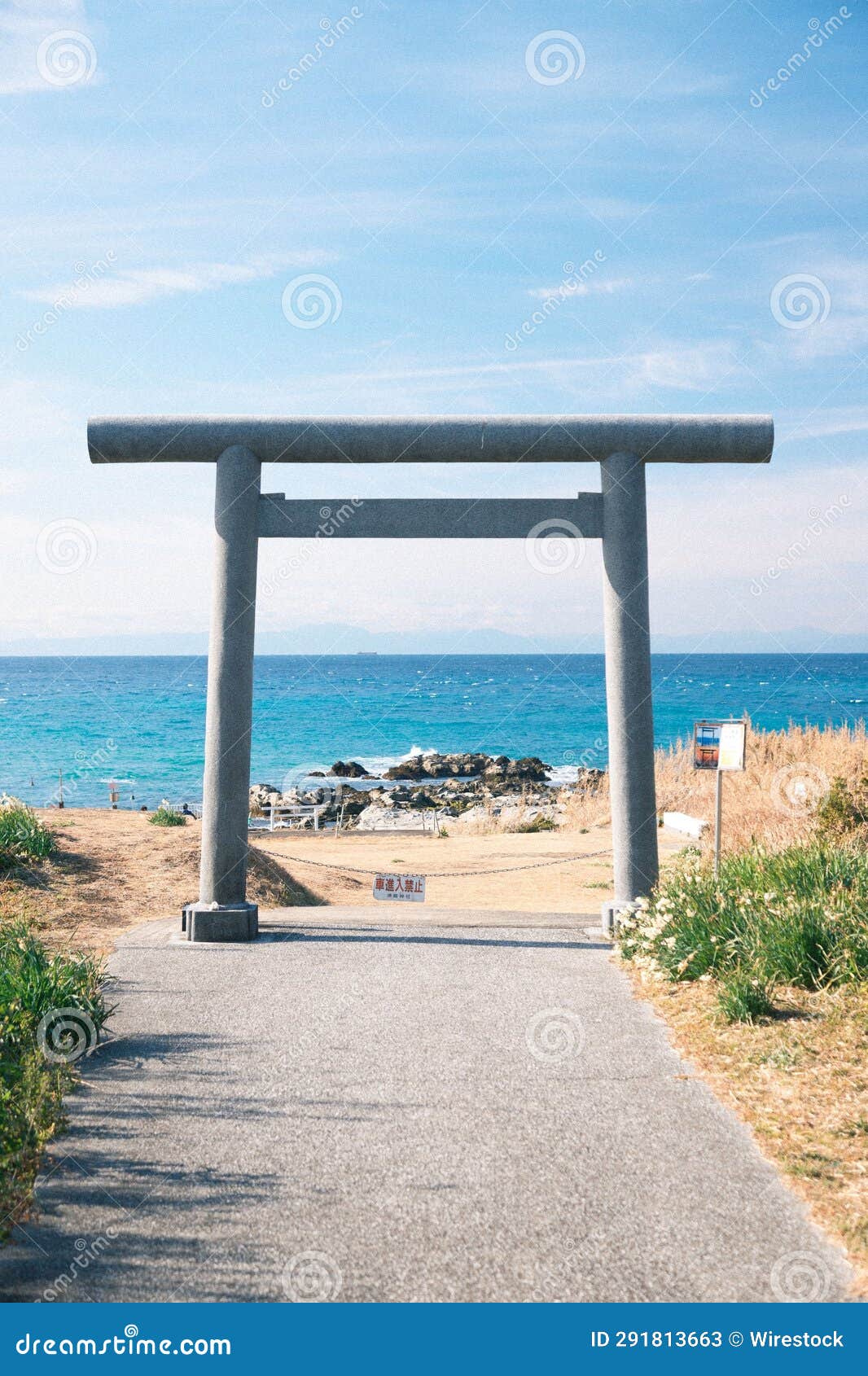Gate at the End of a Paved Pathway, with a Stunning View of the Beach ...