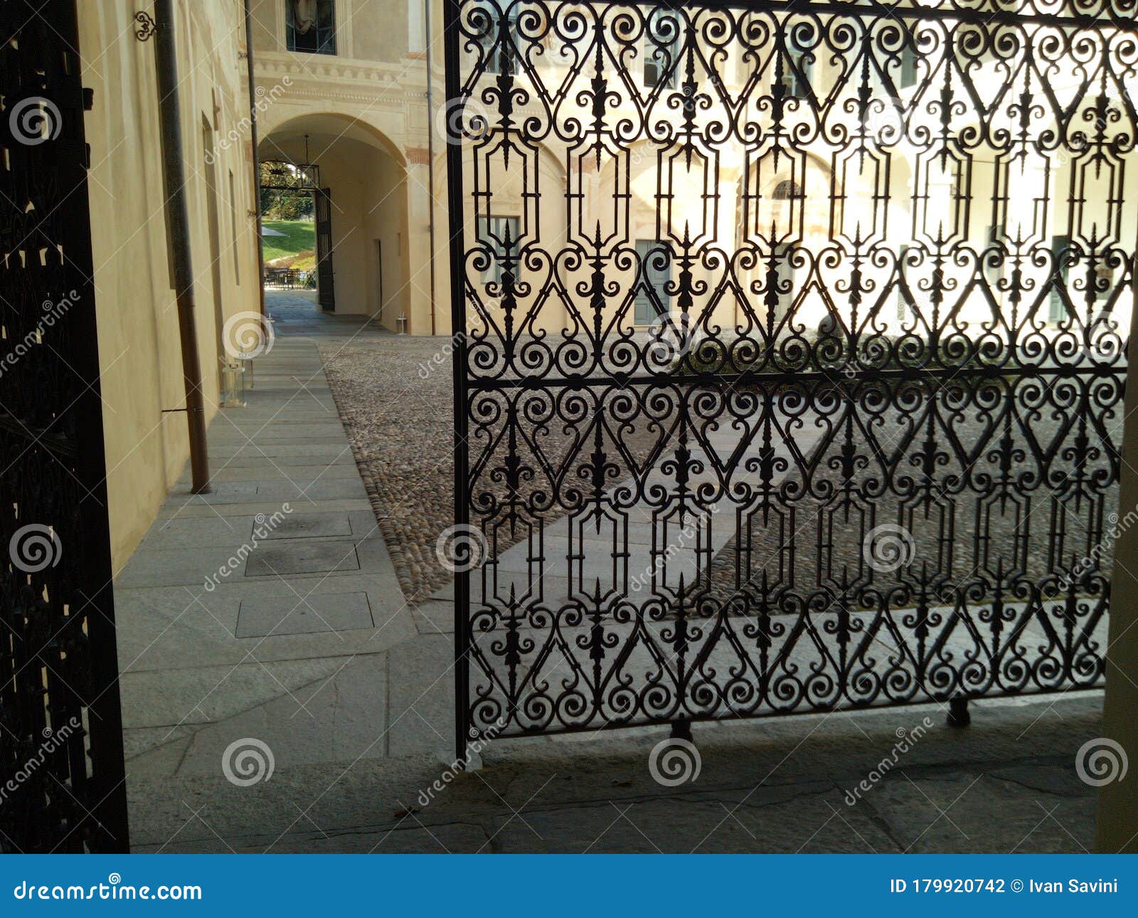 A Gate in Front of a Building Stock Photo - Image of decor, historic ...