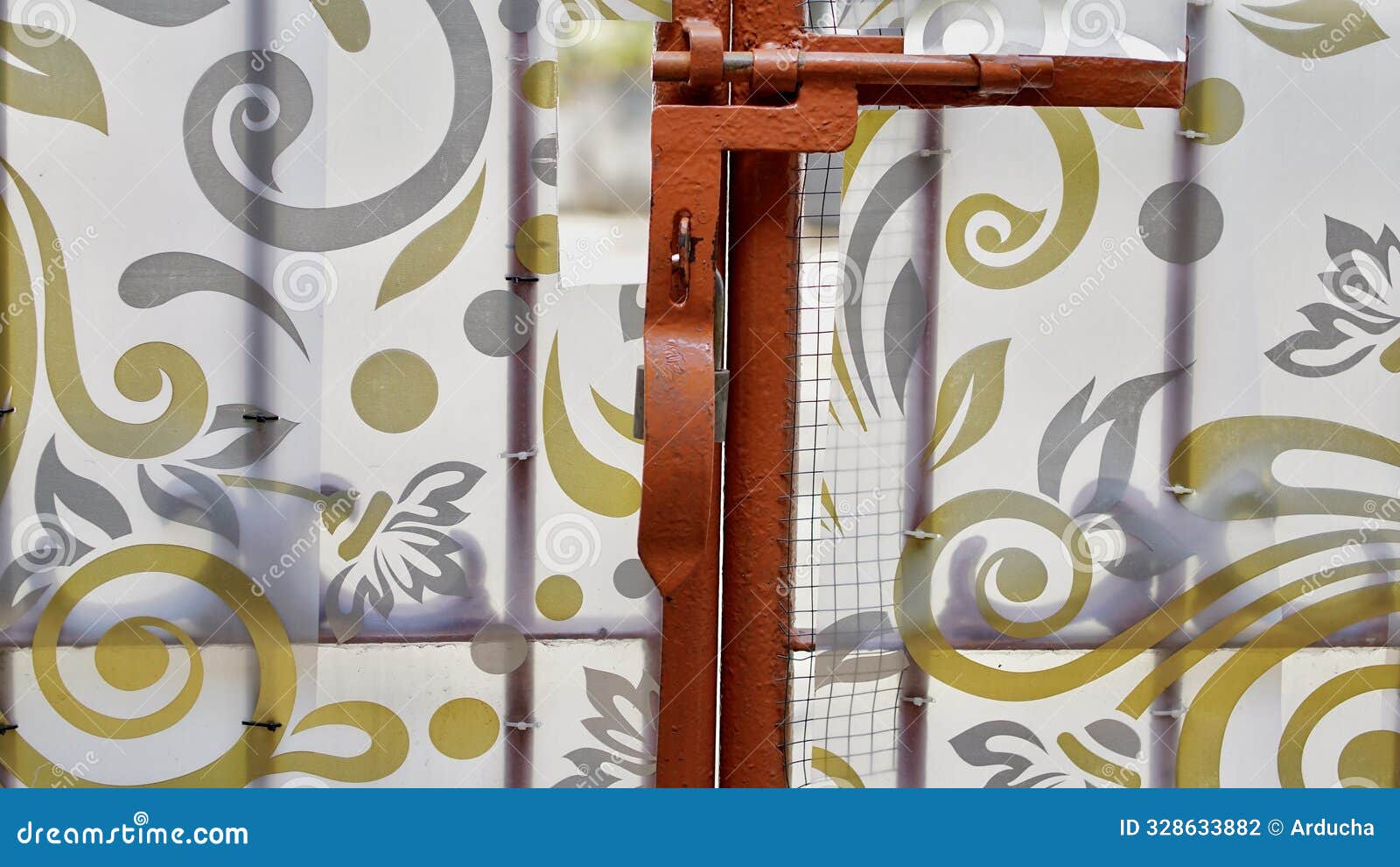 A Gate with a Gold and White Design is Open Stock Photo - Image of ...