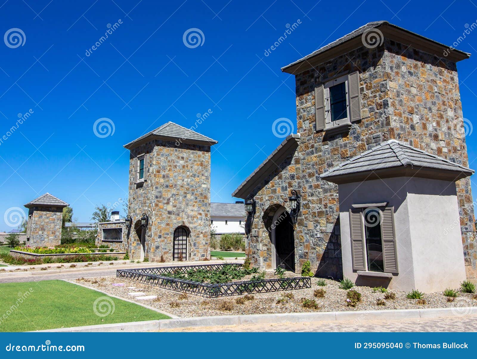 Gate Houses To Secure Subdivision Stock Photo - Image of doorways ...