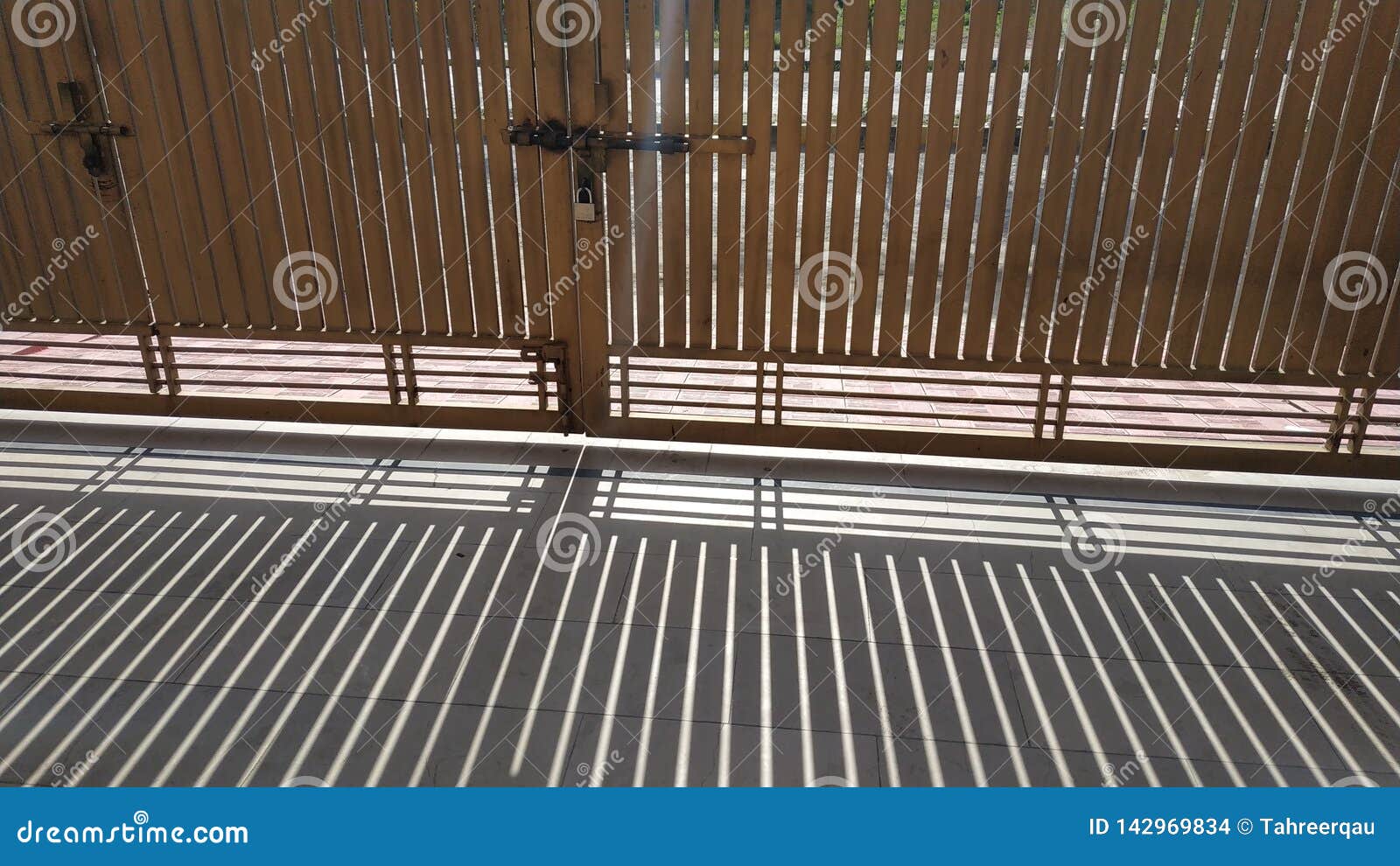 Gate and shadows stock photo. Image of pattyerns, background - 142969834