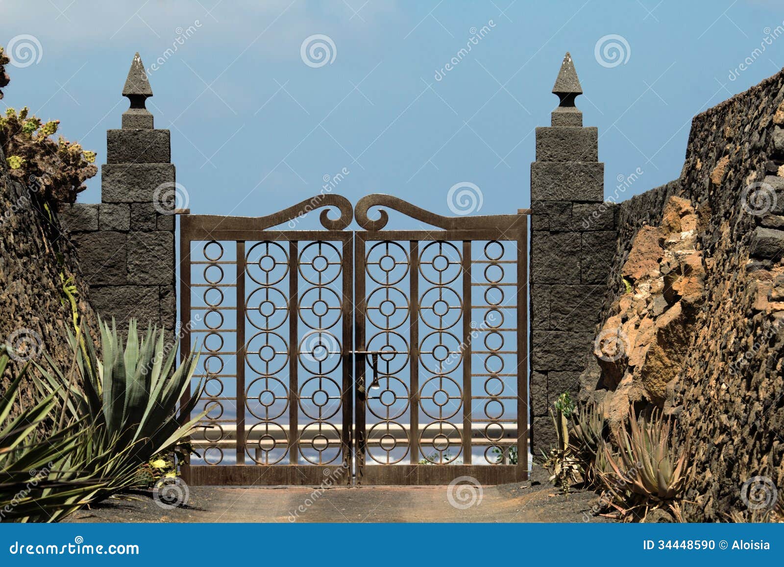 Gate to the cactus garden stock photo. Image of circles - 34448590
