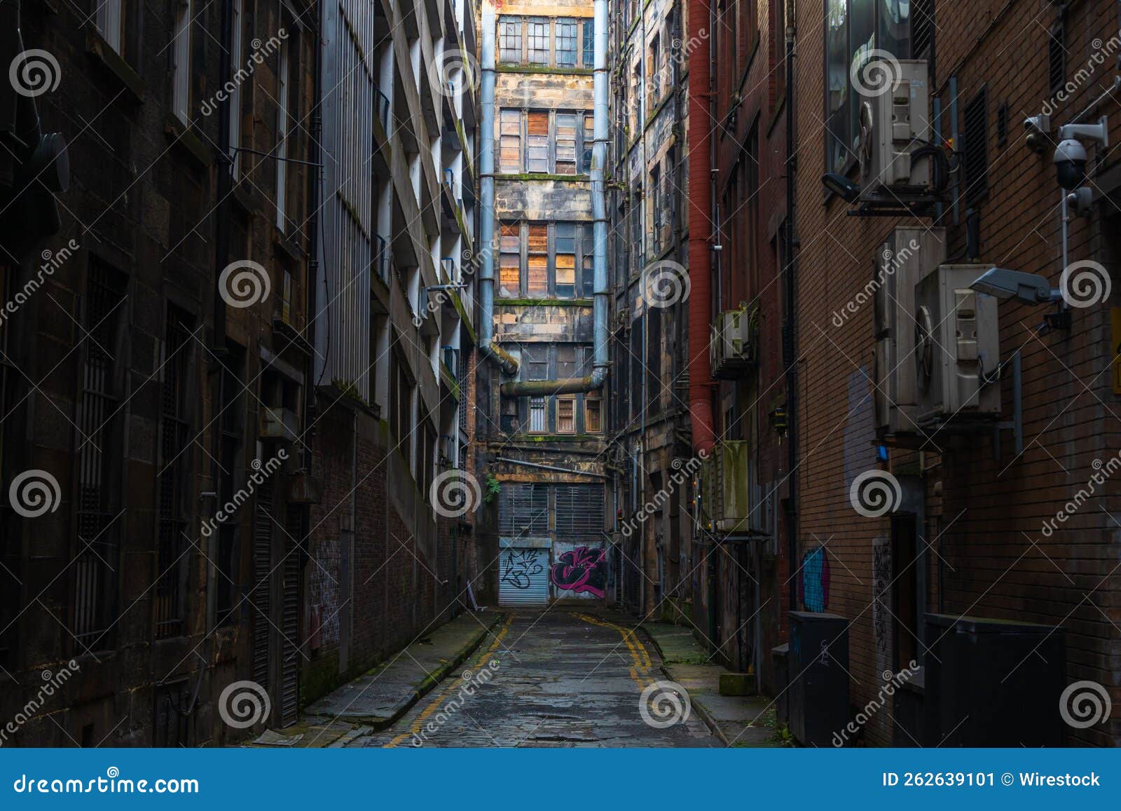 Gateway between Tall Old Brick Buildings with Windows, Glasgow ...