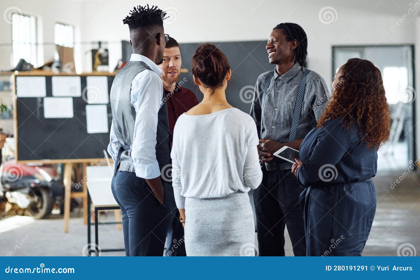 Gathering Around for a Quick Update. a Group of Businesspeople Having a ...