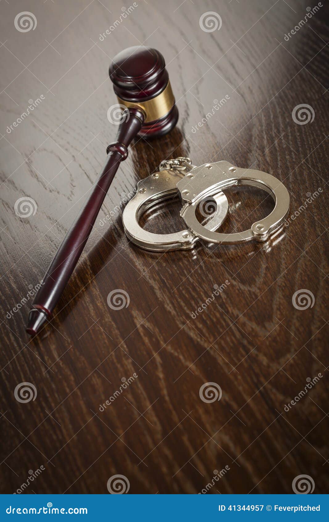 Gavel and Pair of Handcuffs on Table Stock Image - Image of handcuff ...