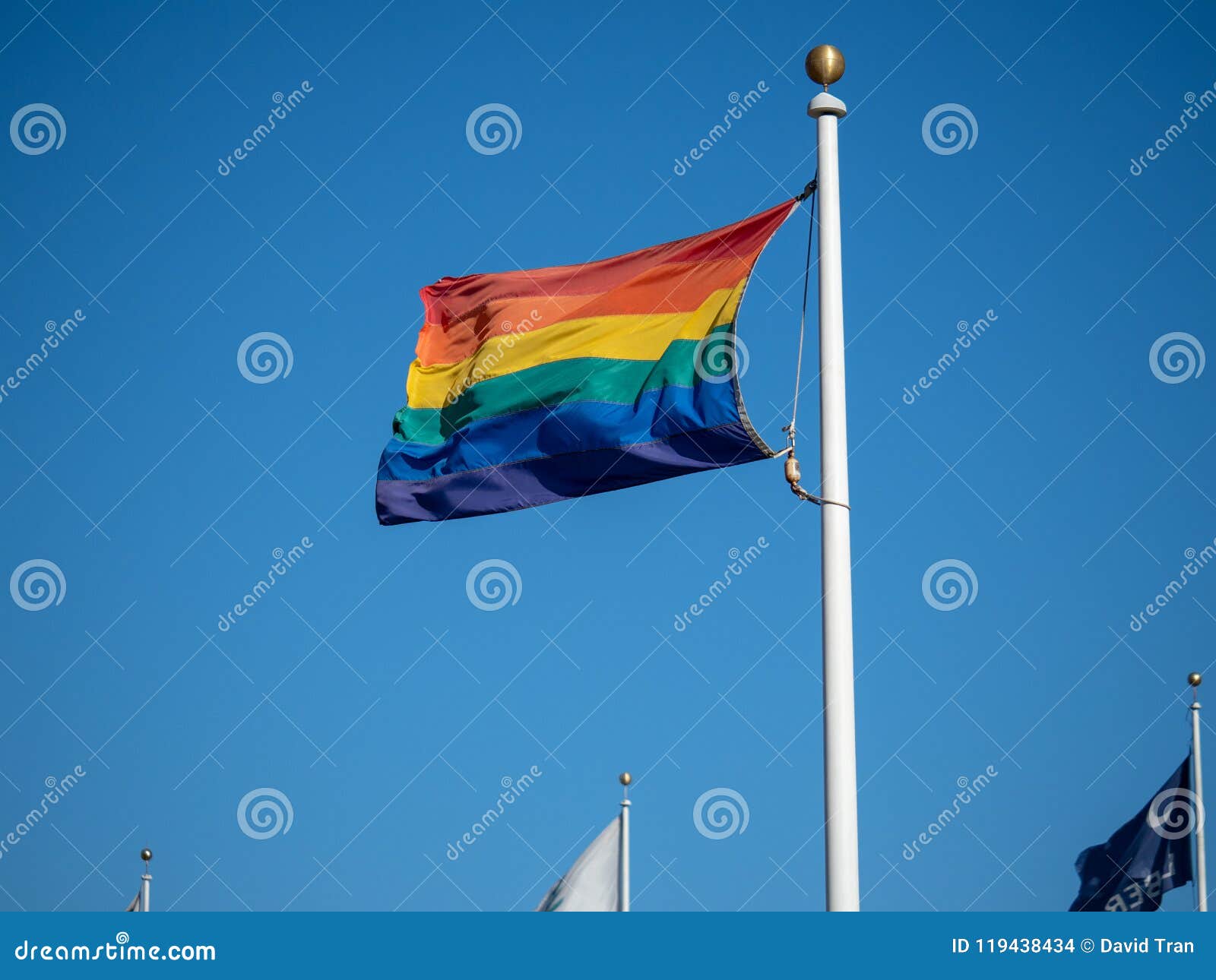 Gay Pride Flag Waving in Air with a Cloudless Sky Stock Photo - Image ...