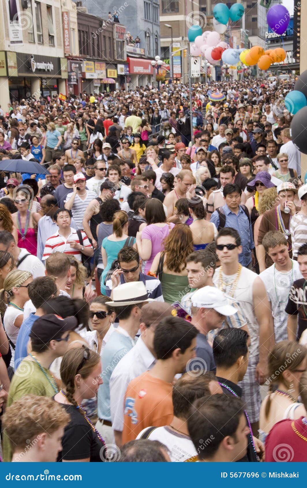 Gay Pride Parade, Crowd Of People With Man Waving Rainbow Flag ...