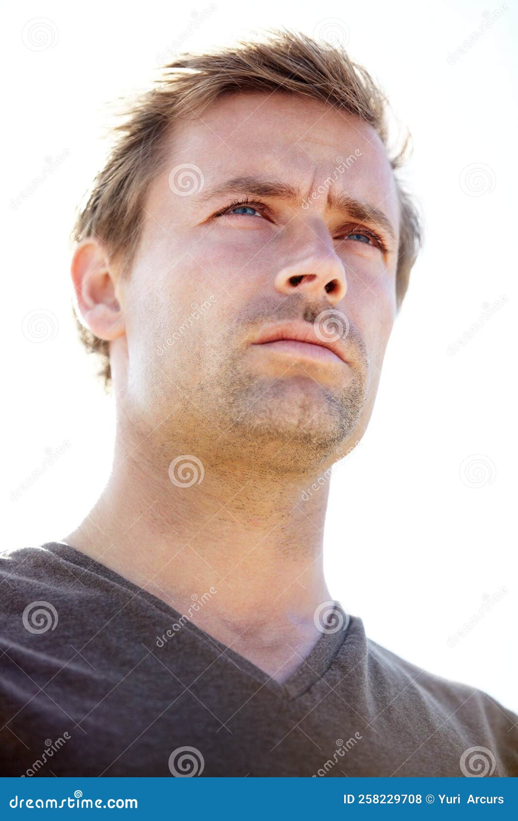 Gazing into the Future...Low-angle Closeup Shot of a Handsome Young Man ...
