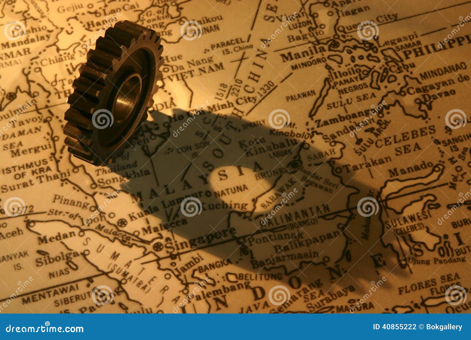 Gear on map (Asean region) stock photo. Image of golden - 40855222