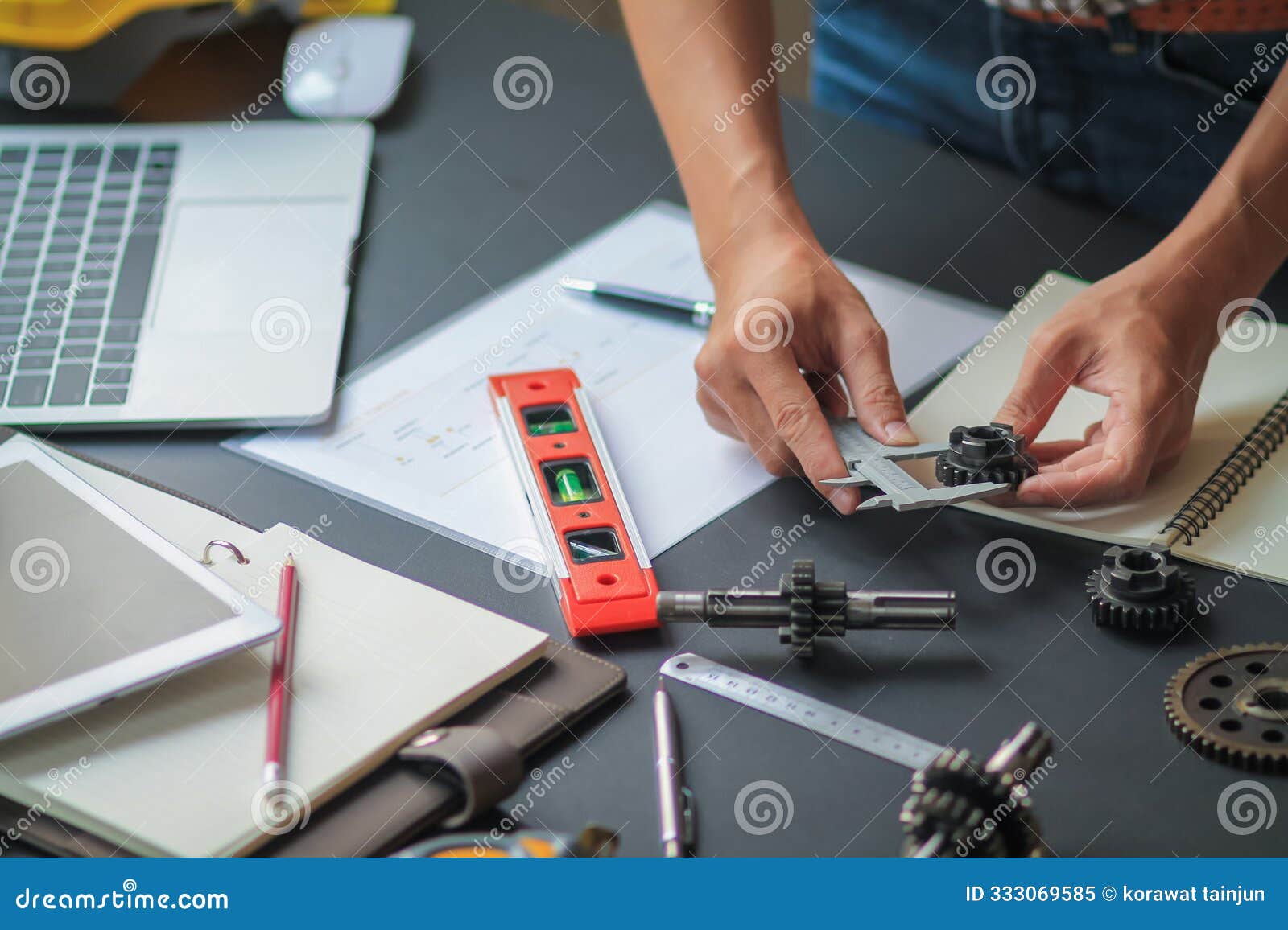 The Gear Set is Placed on the Workbench of a Team of Factory Mechanical ...