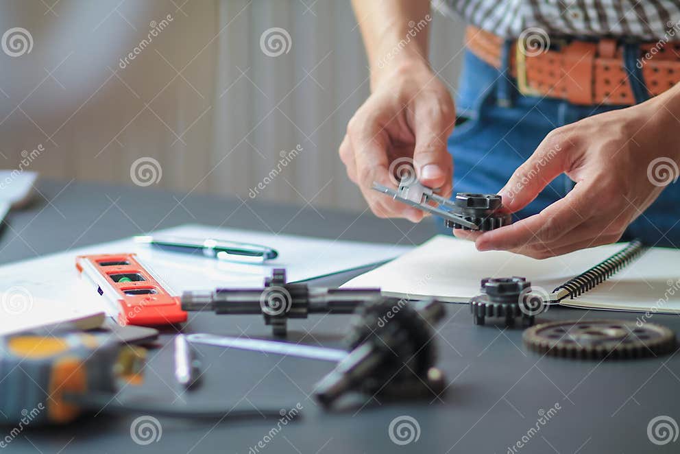 The Gear Set is Placed on the Workbench of a Team of Factory Mechanical Engineers To Study and ...