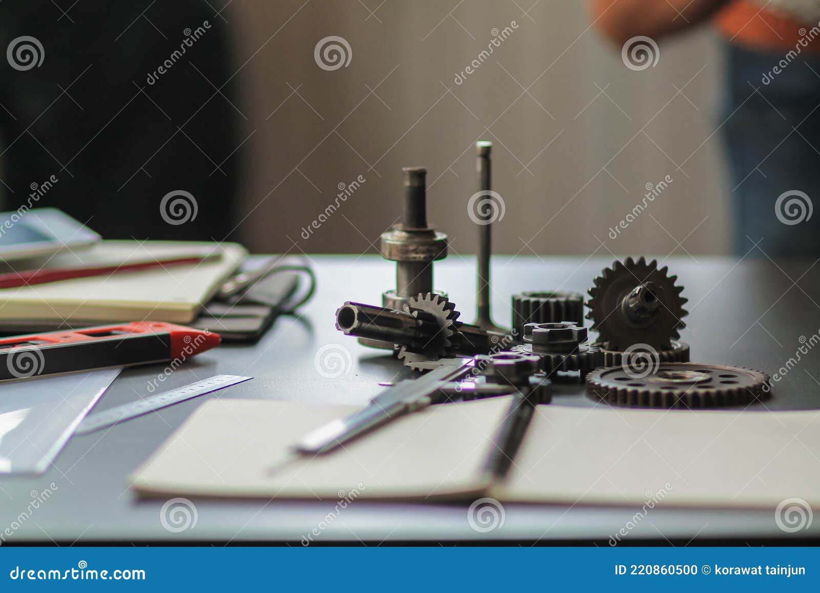 The Gear Set is Placed on the Workbench of a Team of Factory Mechanical ...