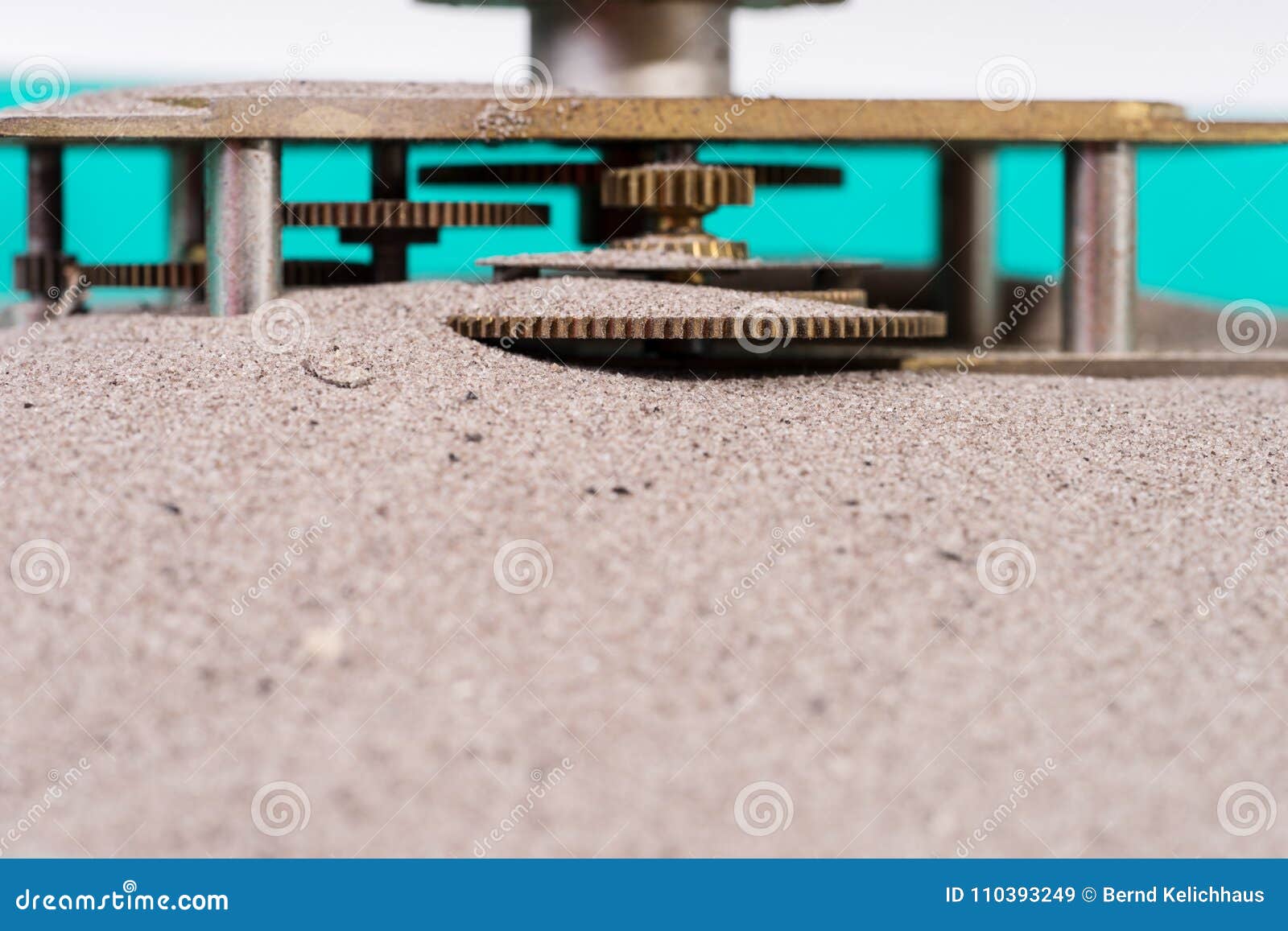 Gear wheels in the sand stock image. Image of mechanical - 110393249