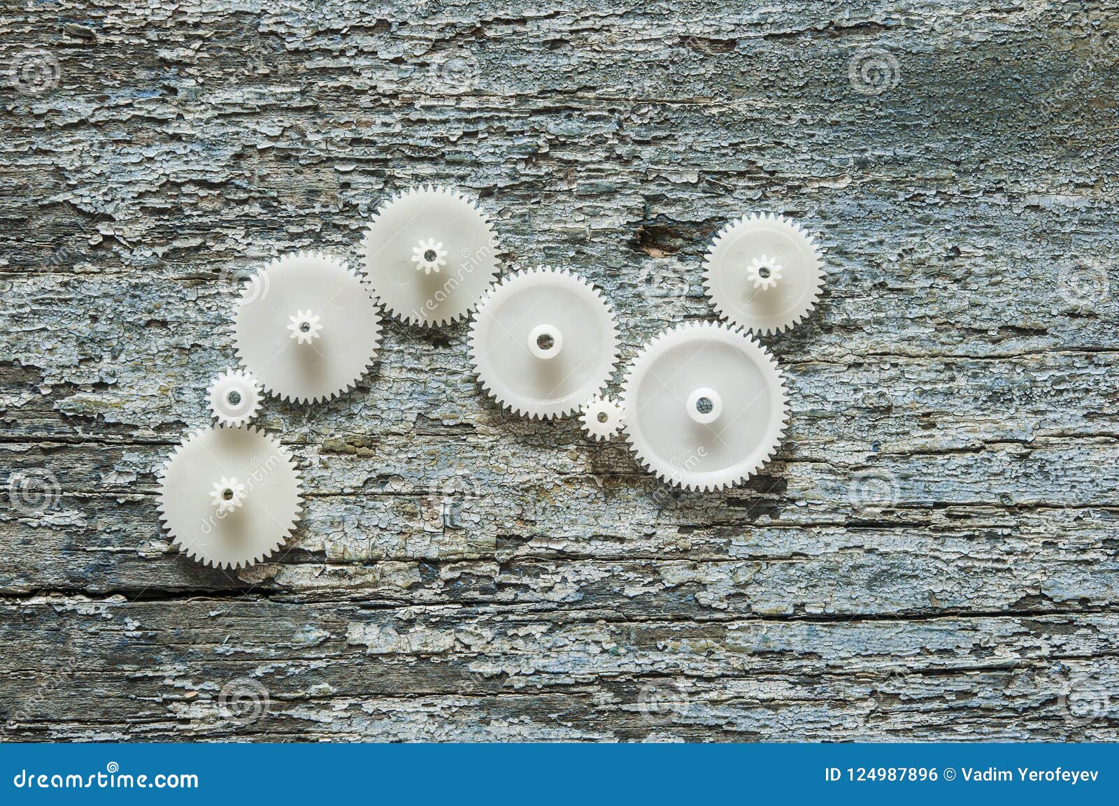 Gear Wheels on a Wooden Background. the Concept of Creative, Log Stock ...