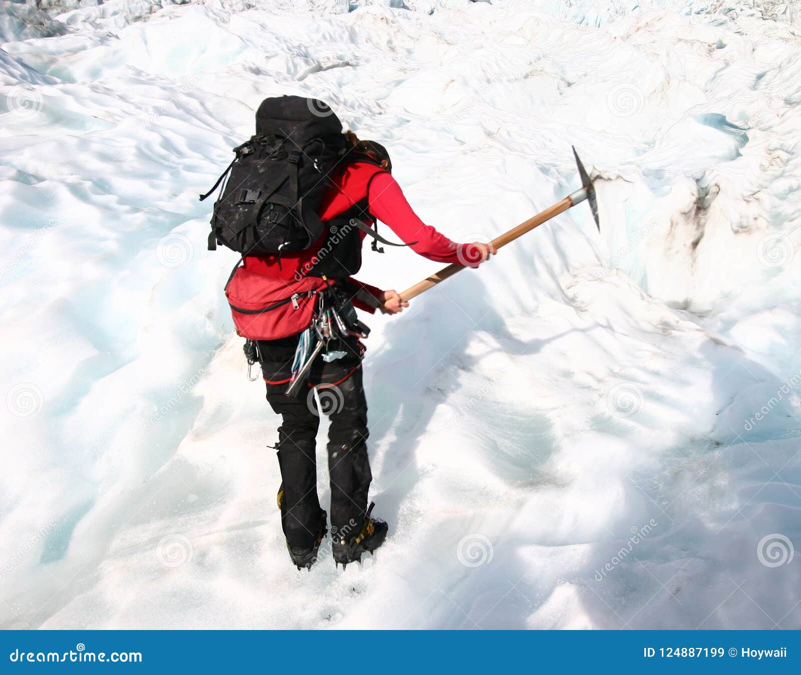 Hiker Using Pickaxe on Icy Terrain Editorial Stock Image - Image of ...