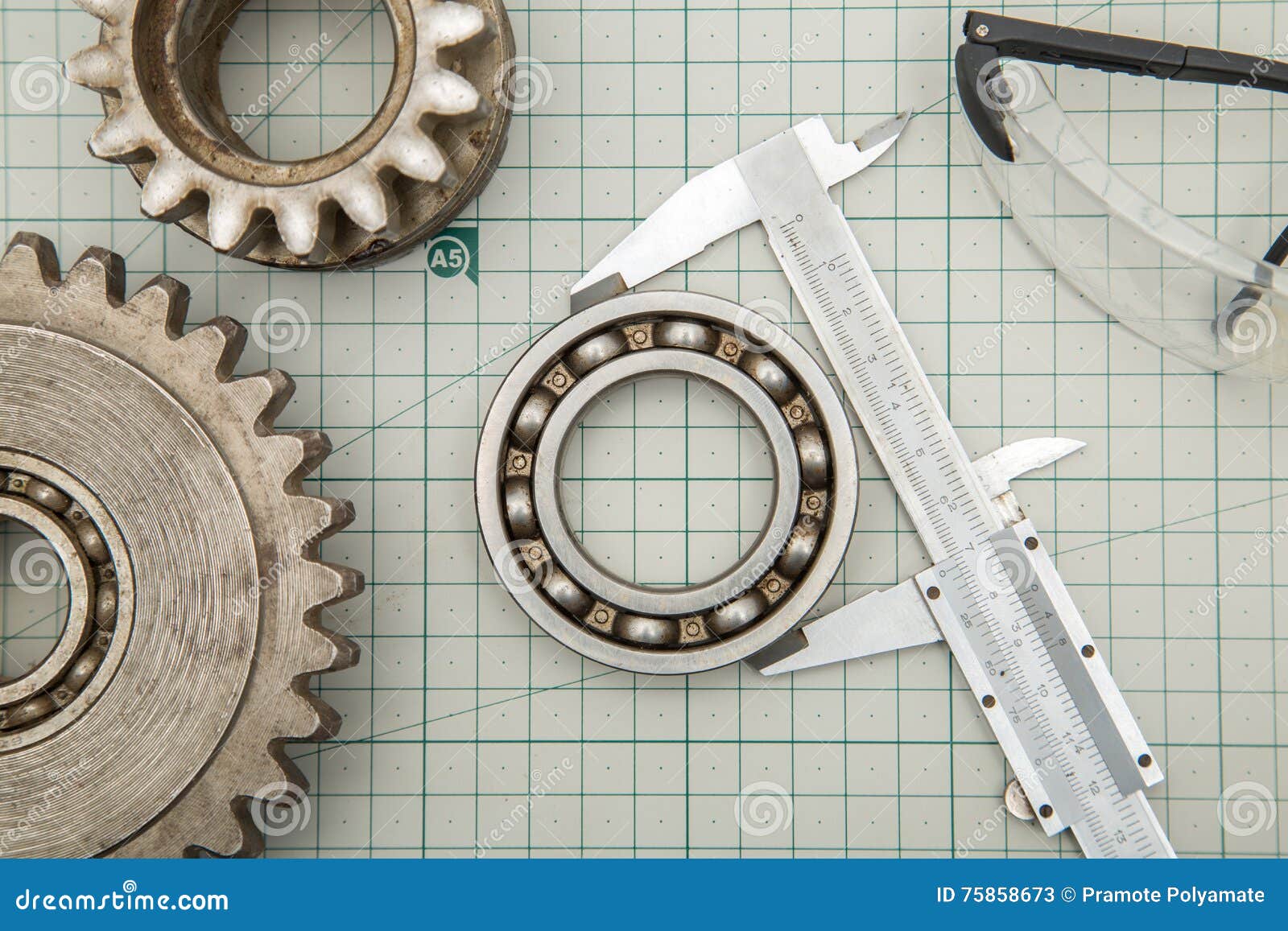 Gears and Caliper on Graph Paper Stock Image - Image of concept, ruler ...