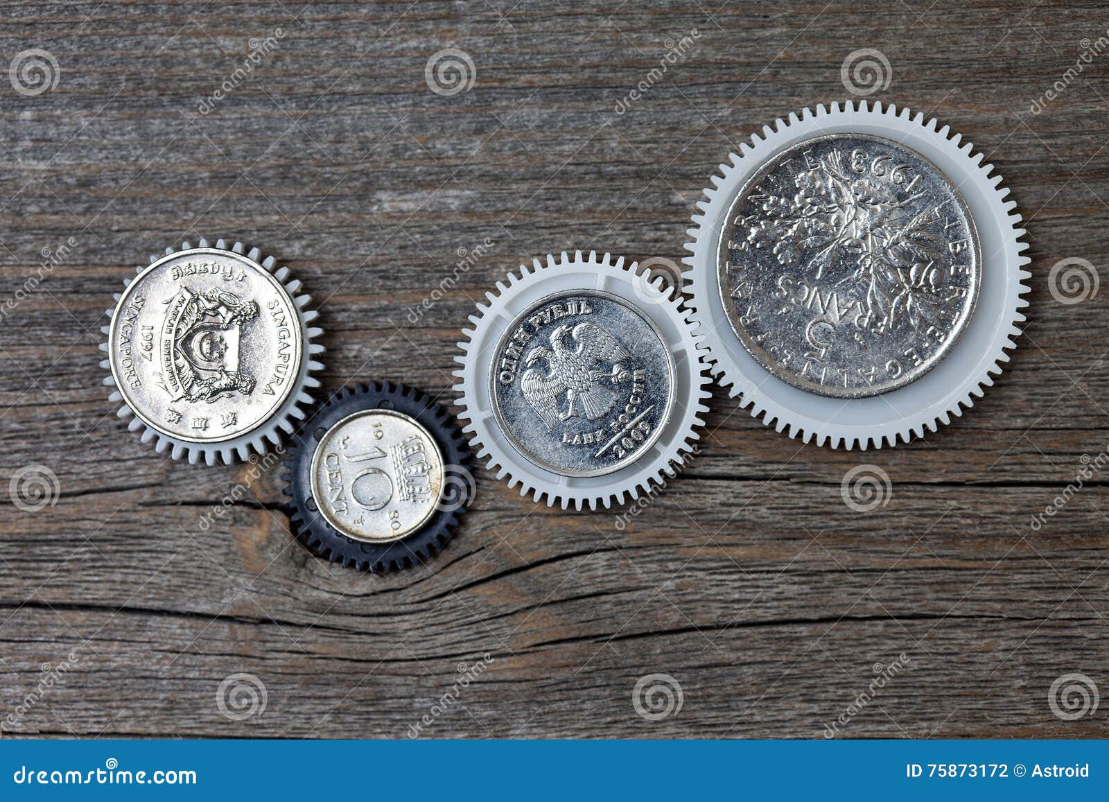 Gears with coins inside stock photo. Image of business - 75873172
