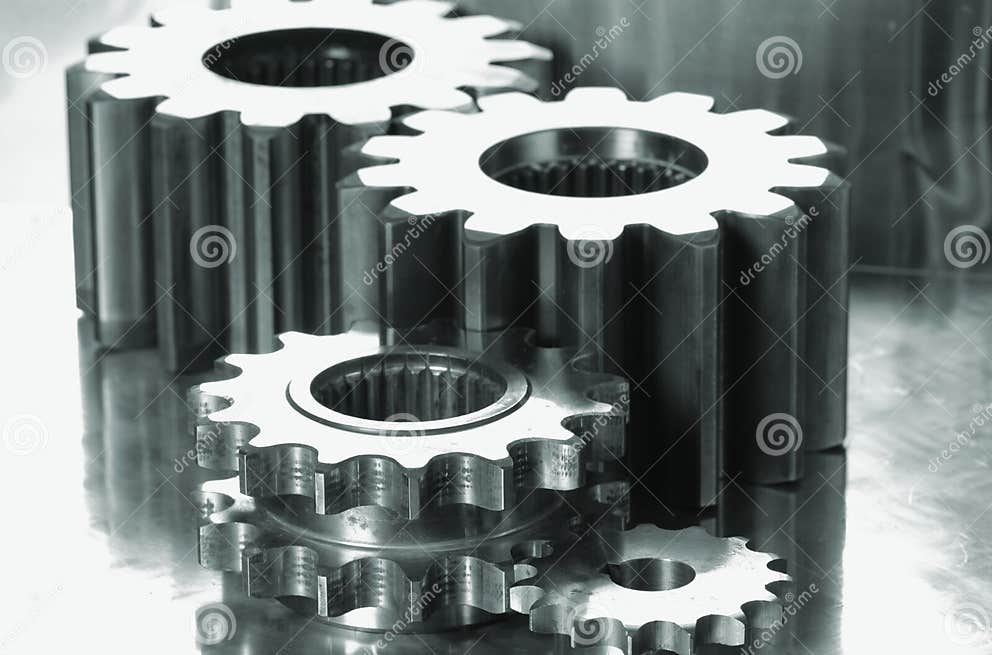 Gears in a Shiny Titanium Assembly Stock Photo - Image of metallic ...