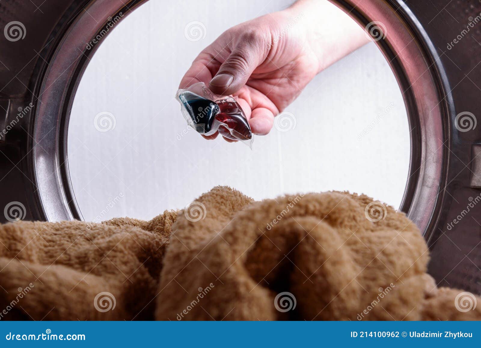 Gel Capsule for a Washing Machine. in the Hands of Throwing in a Drum ...