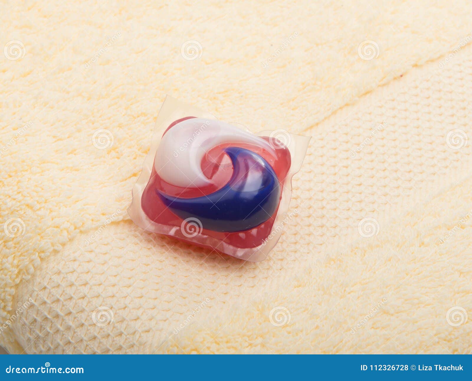Gel Capsule for Washing Powder on Fabric or Cloth Stock Photo - Image ...