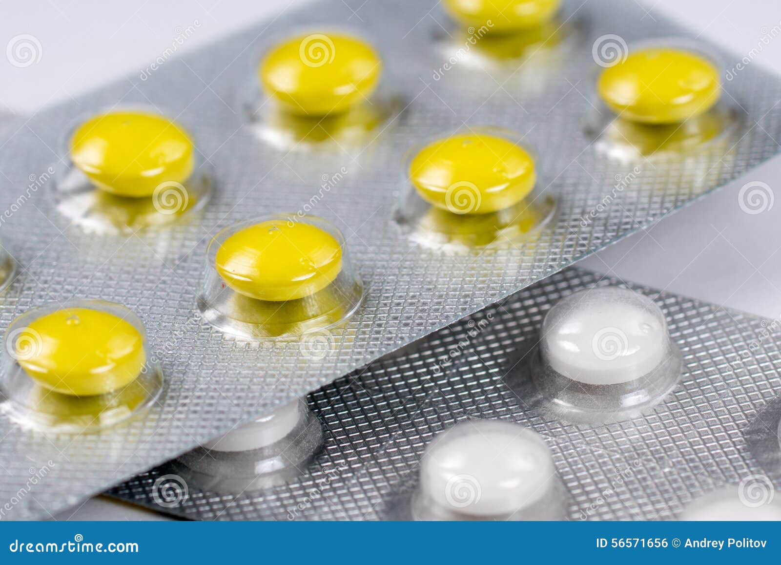 Gele en witte pillen 2 stock foto. Image of apotheek - 56571656