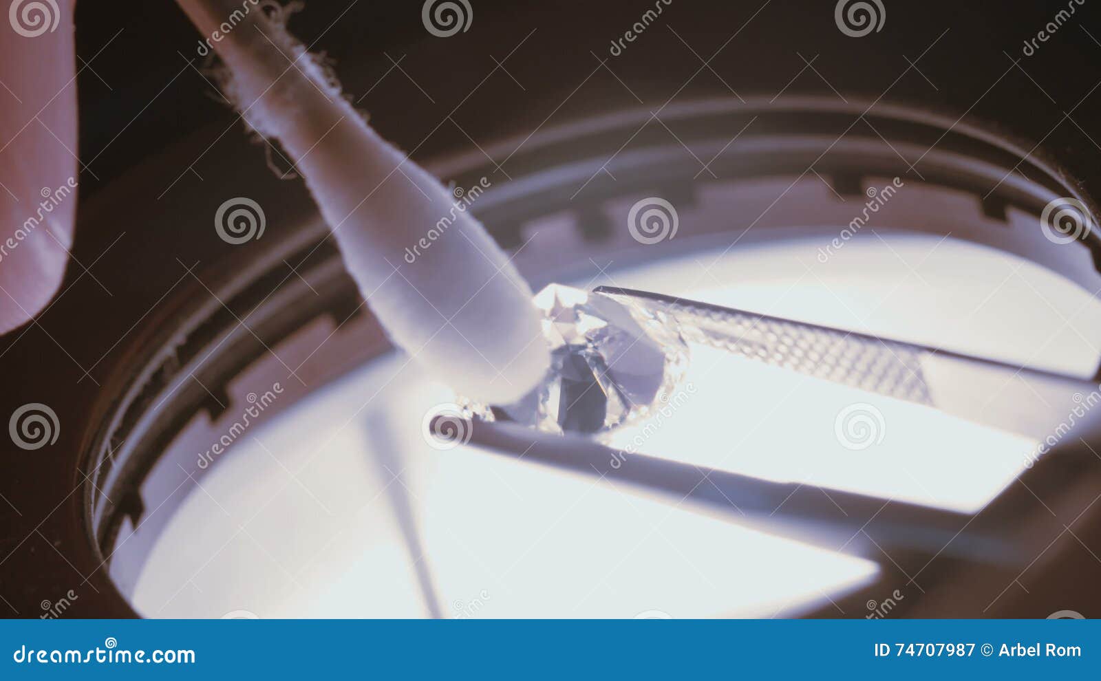 A Gemologist Inspecting a Large Diamond Under a Microscope Stock Video ...